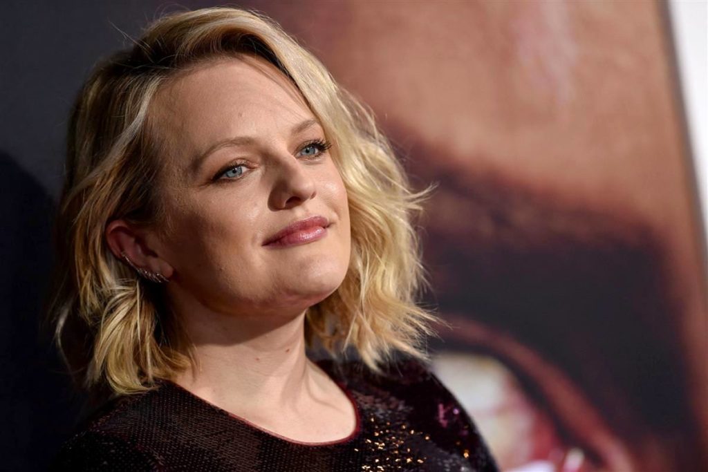 Elisabeth Moss in Tom Ford at "The Invisible Man" Los Angeles Premiere ...